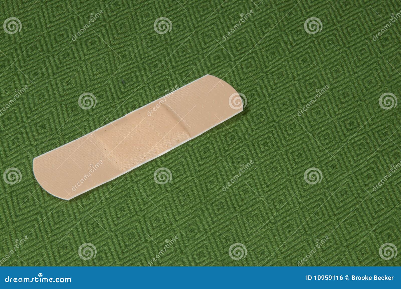 Band Aid on Green stock photo. Image of injury, bandage - 10959116