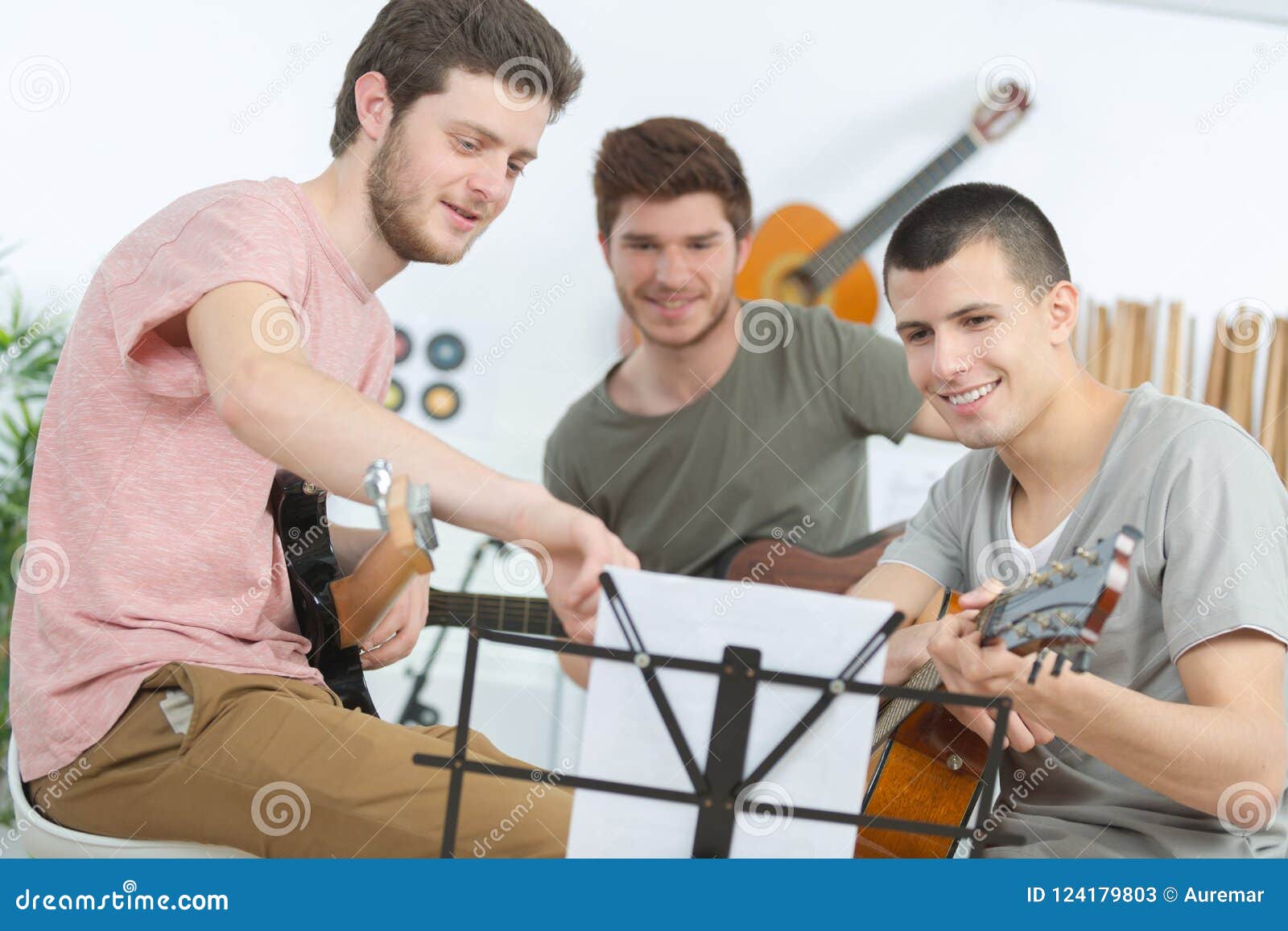 Band of musicians playing stock image. Image of male - 124179803