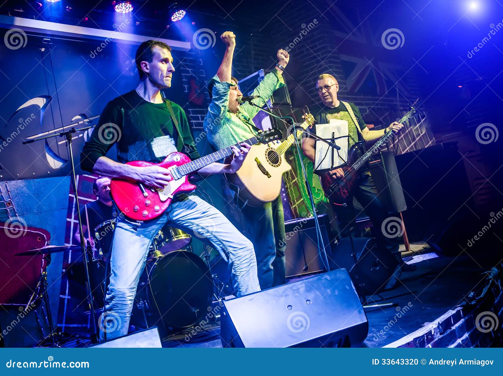 Band performs on stage stock photo. Image of equipment - 33643320