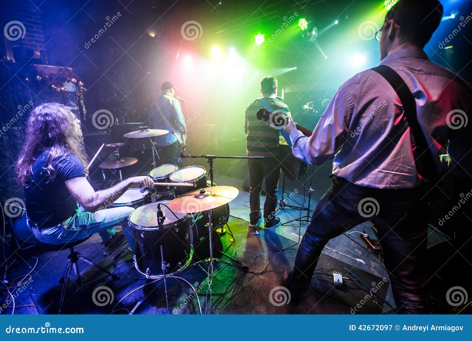 Band performs on stage stock image. Image of music, performance - 42672097