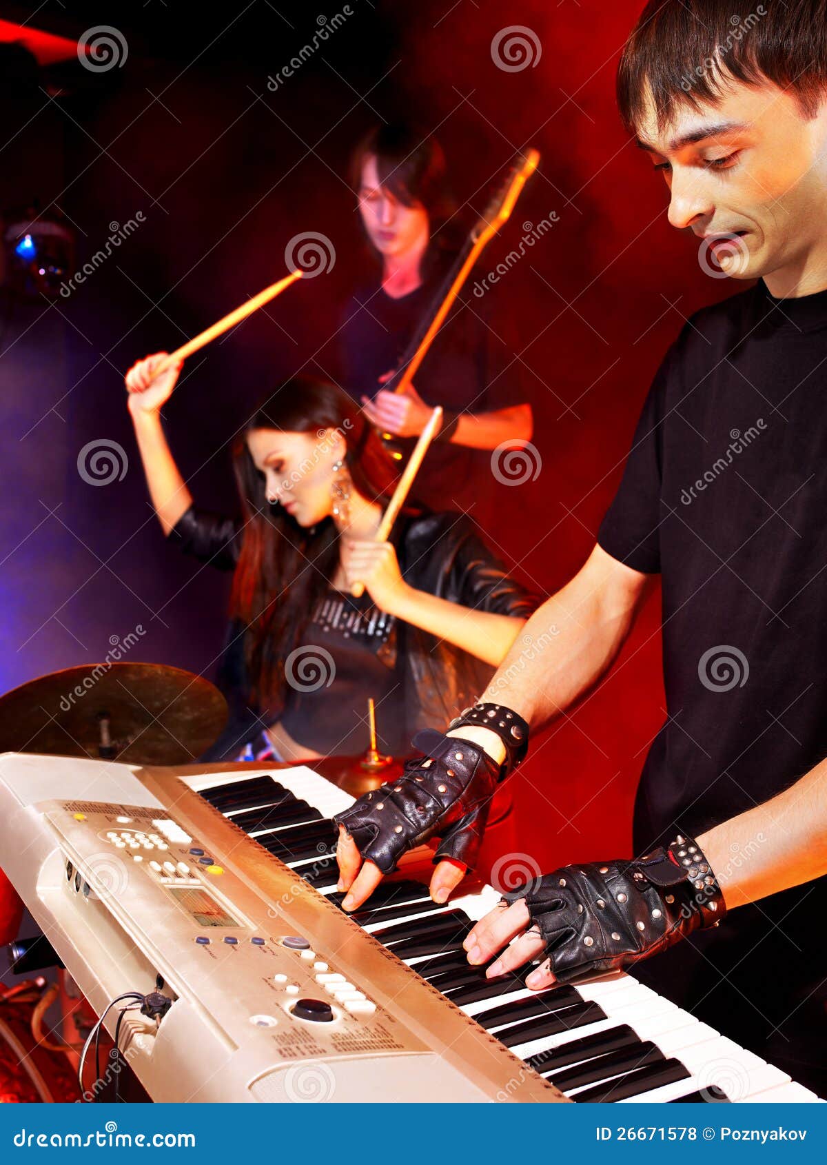 Band Playing Musical Instrument. Stock Photo - Image of night, lighting ...