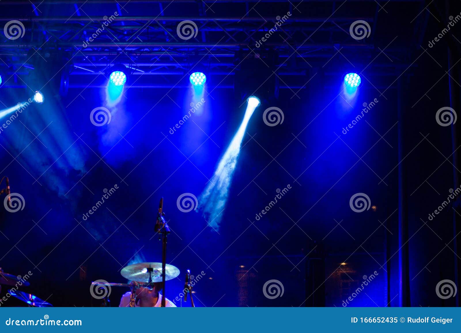 Band on stage light show stock image. Image of stage - 166652435