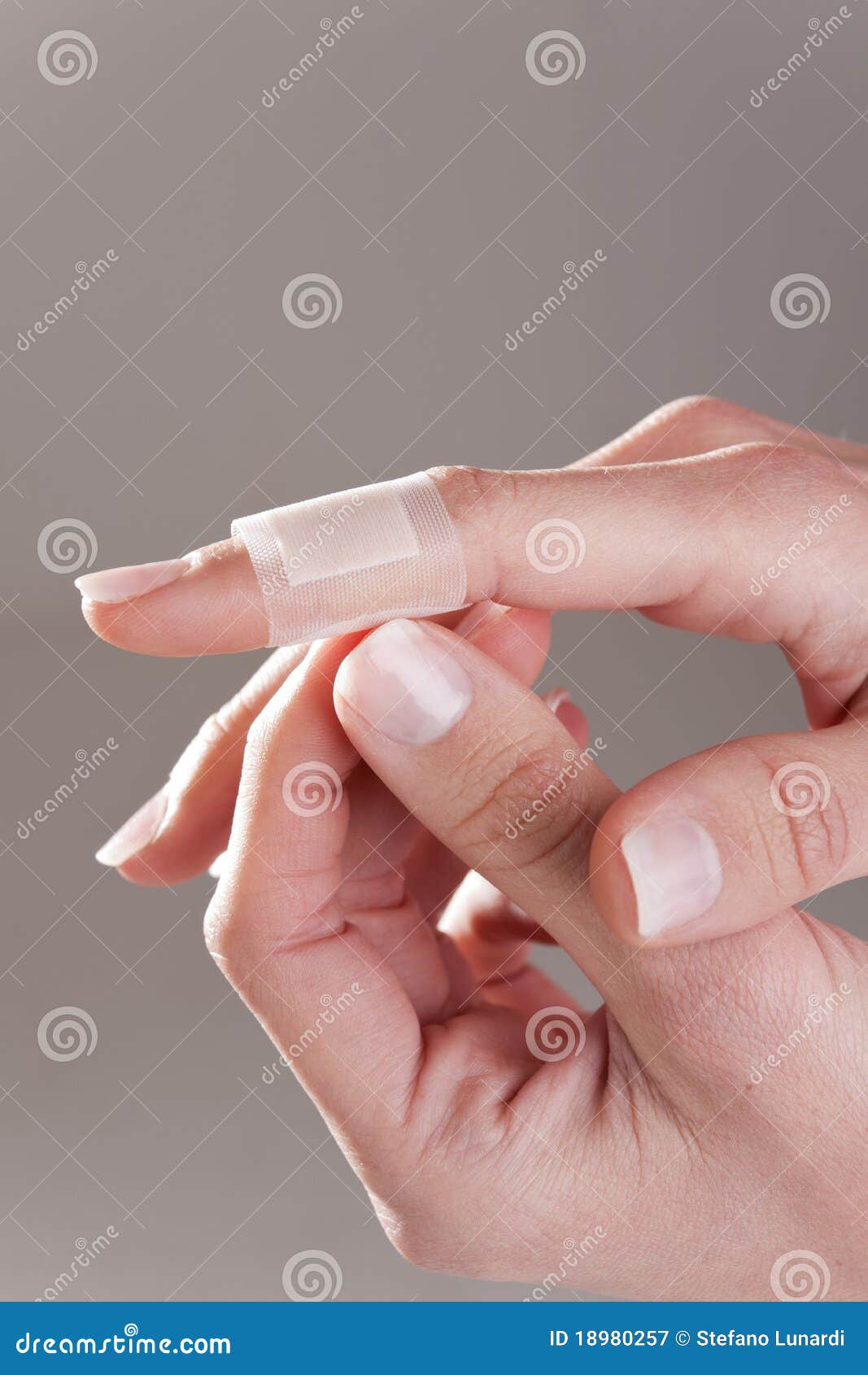 Bandage on female finger stock image. Image of procedure - 18980257