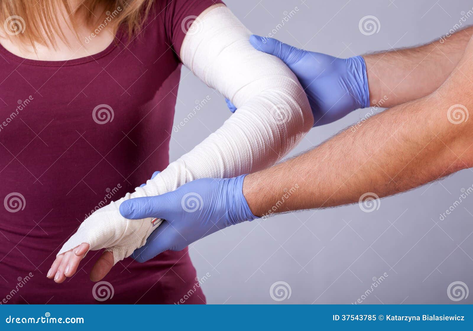 Bandaged arm check up stock image. Image of cotton, helping - 37543785
