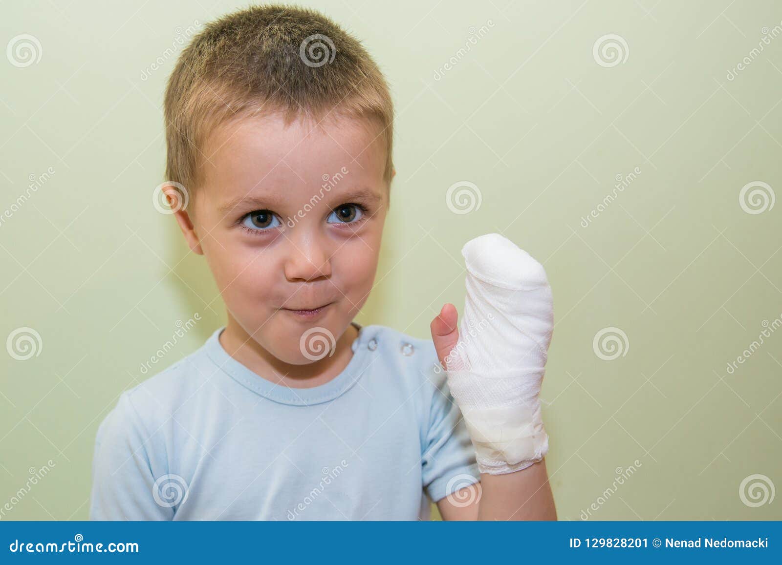 Bandaged arm of a child stock image. Image of disasters - 129828201