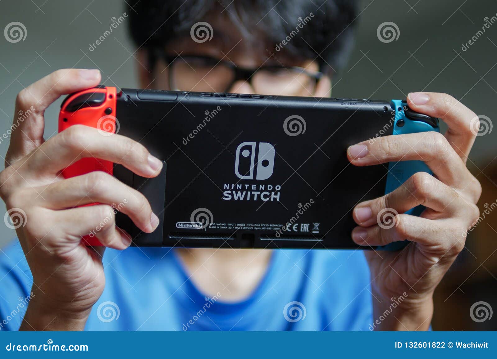 A Man Playing Nintendo Switch Editorial Photography - Image of ...