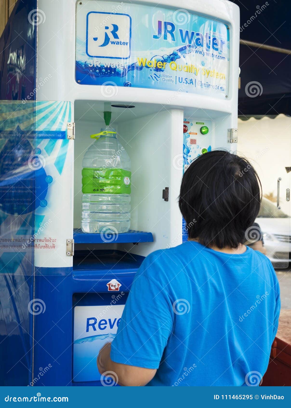 Bangkok, Thailand - June 29, 2015: a Woman Buying Fresh Water with Coin ... Bangkok, Thailand - June 29, 2015: a Woman Buying Fresh Water with Coin ...