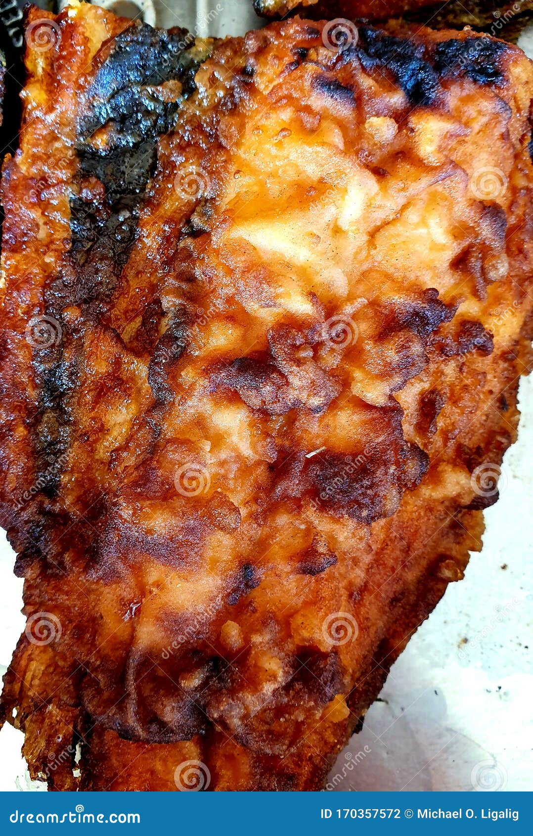 Bangus or Milk Fish Deep Fried in Oil Stock Photo - Image of bangus ...