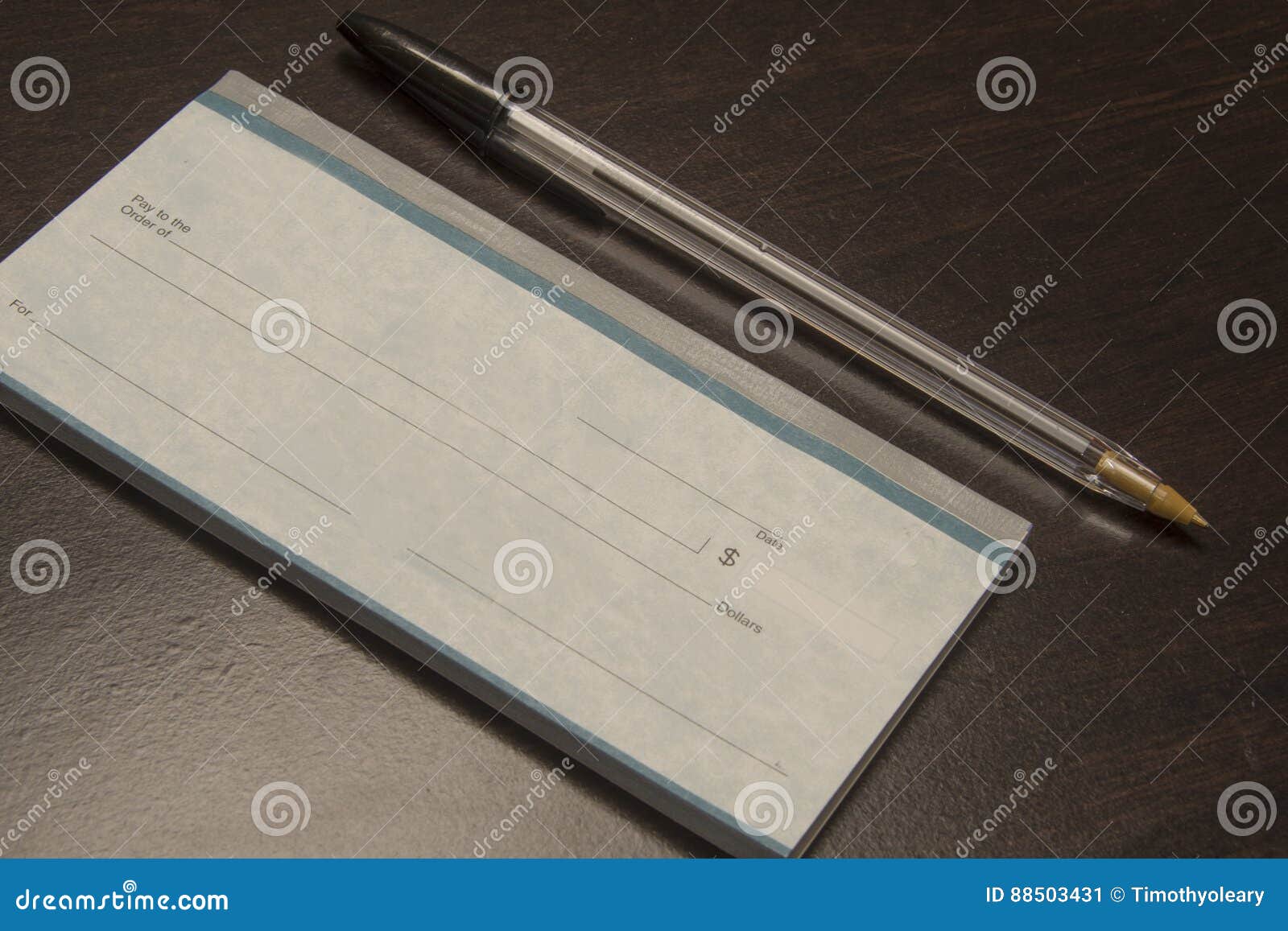 Bank Check and a pen stock image. Image of bank, bills - 88503431