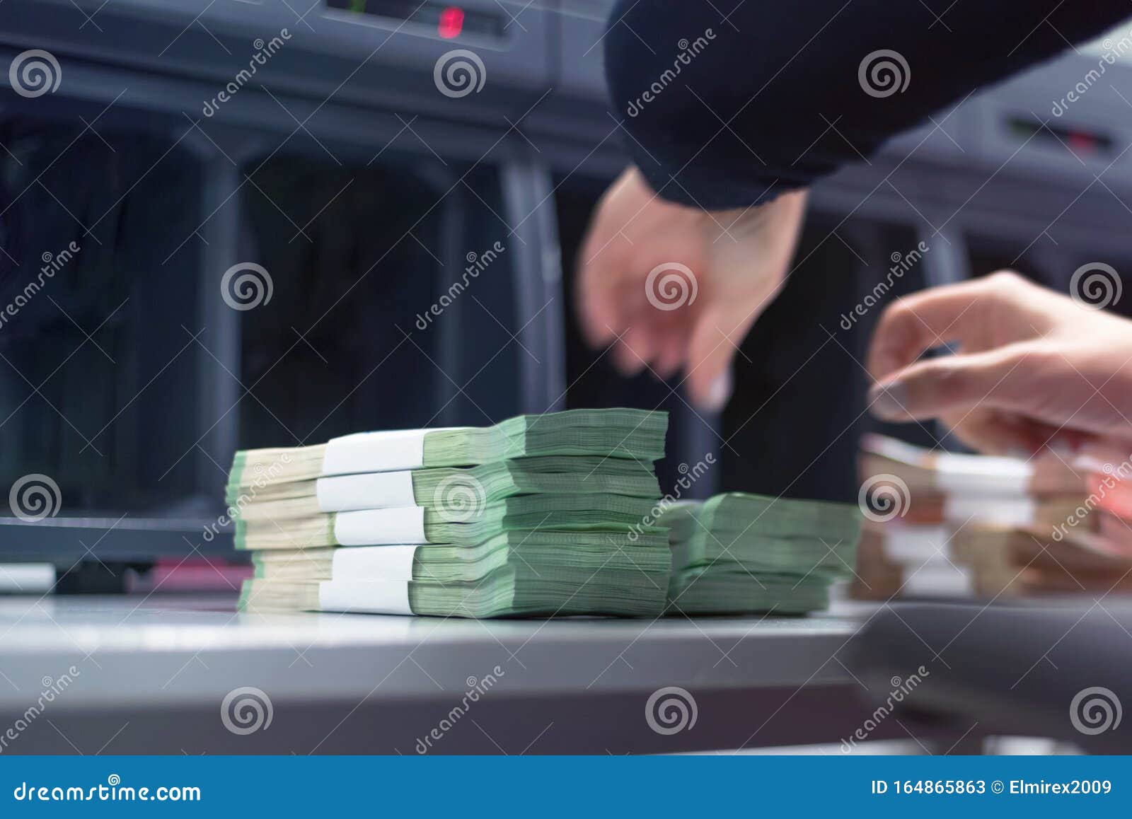 Bank Employees Sorting and Counting Money Inside Bank Vault. Large ...