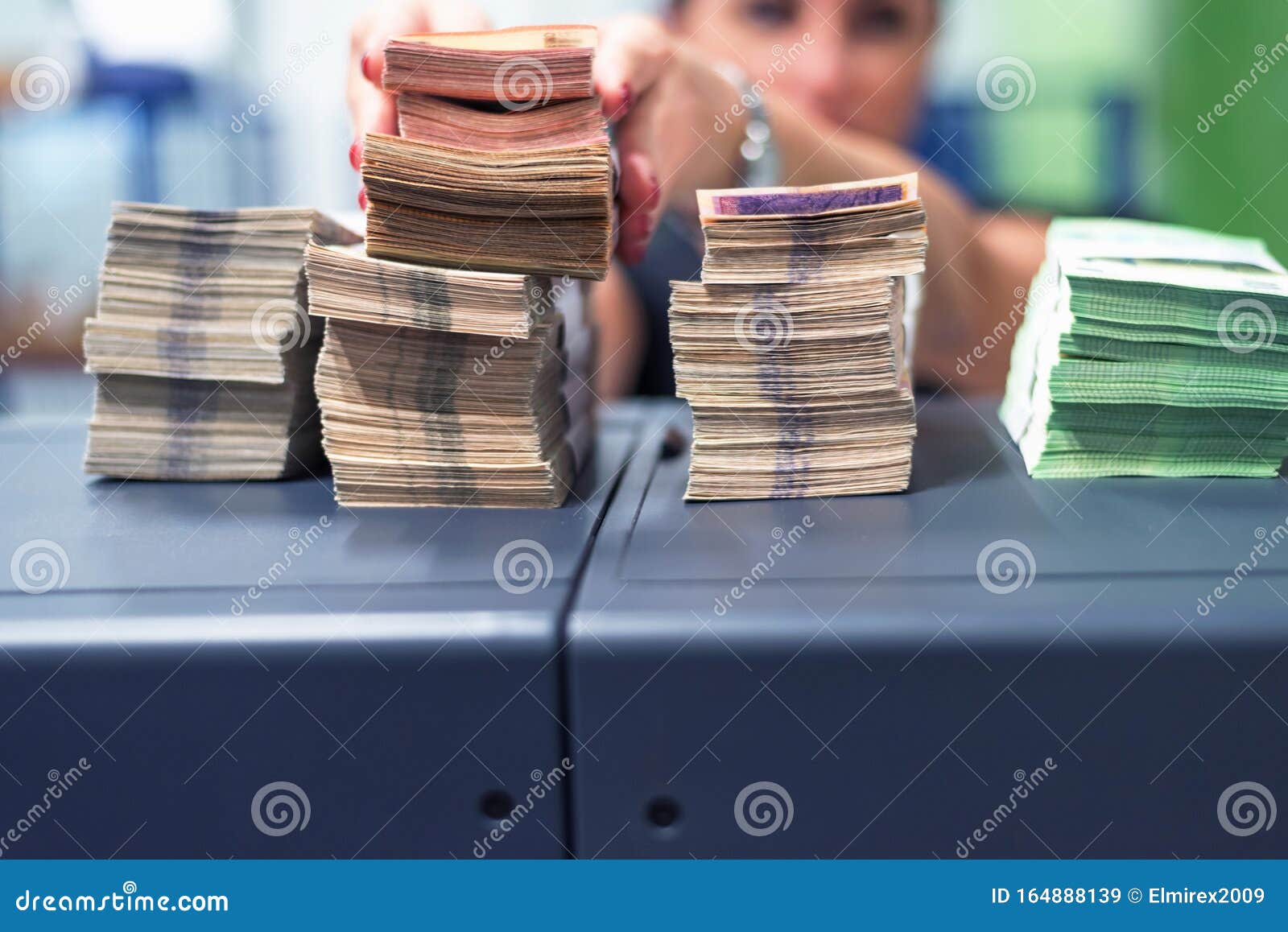 Bank Employees Sorting and Counting Money Inside Bank Vault. Large ...