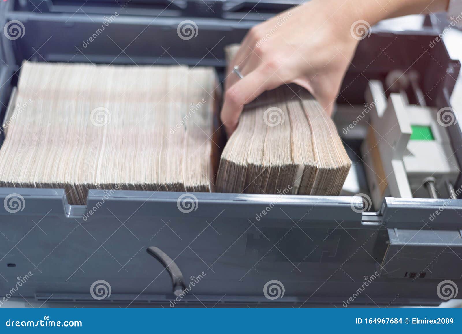 Bank Employees Sorting and Counting Money Inside Bank Vault. Large ...