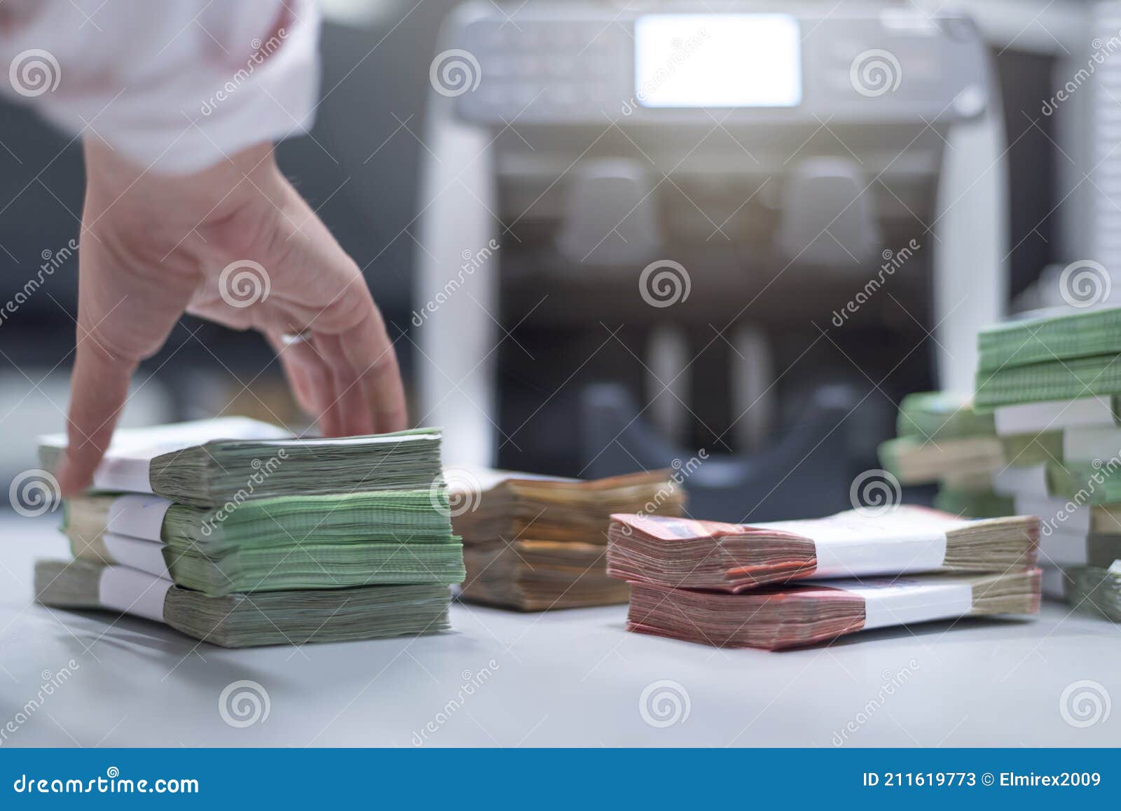 Bank Employees Sorting and Counting Money Inside Bank Vault. Large ...