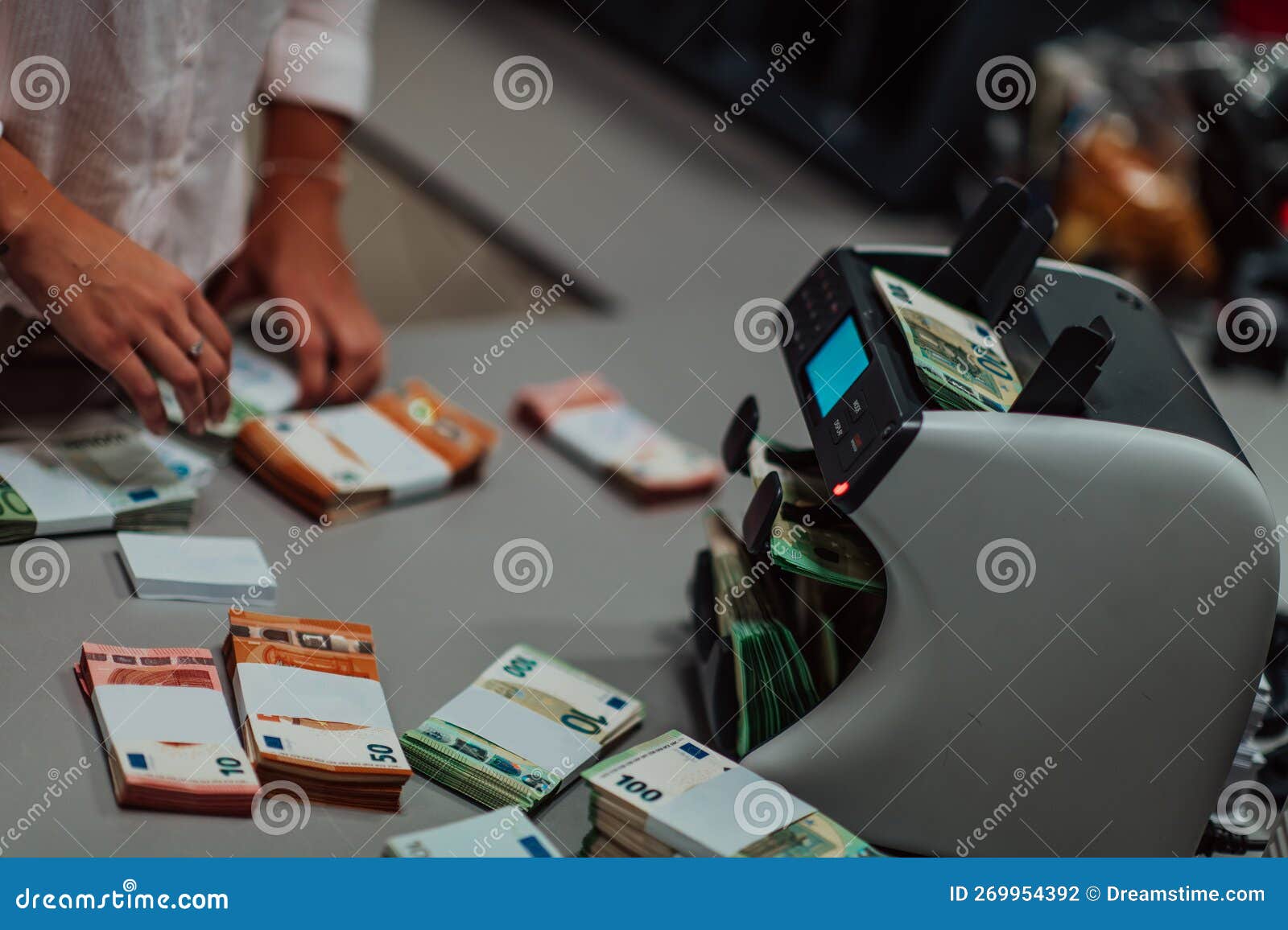Bank Employees Using Money Counting Machine while Sorting and Counting ...
