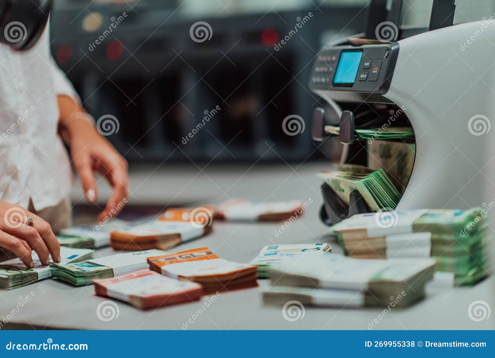 Bank Employees Using Money Counting Machine while Sorting and Counting ...
