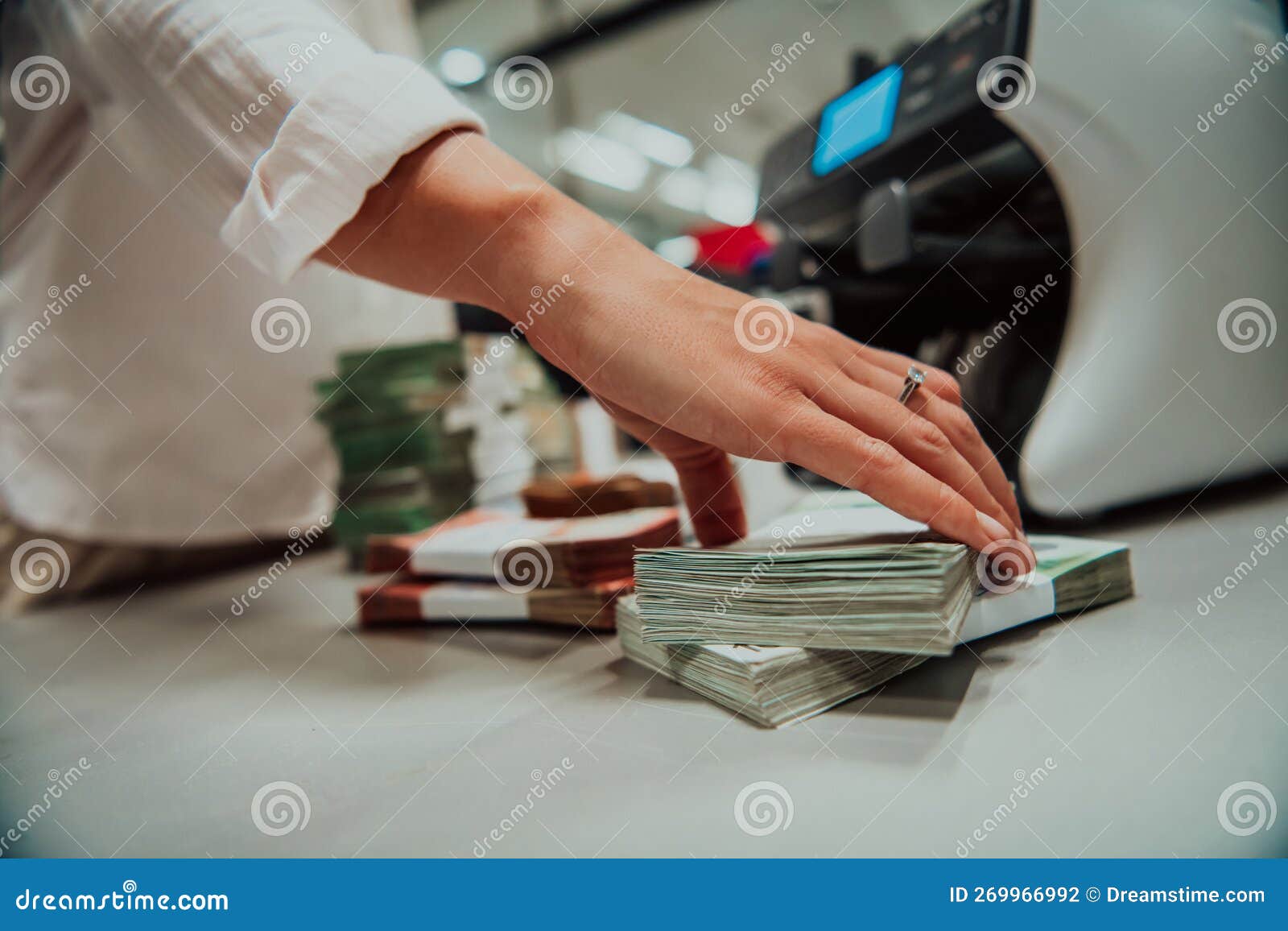 Bank Employees Using Money Counting Machine while Sorting and Counting ...