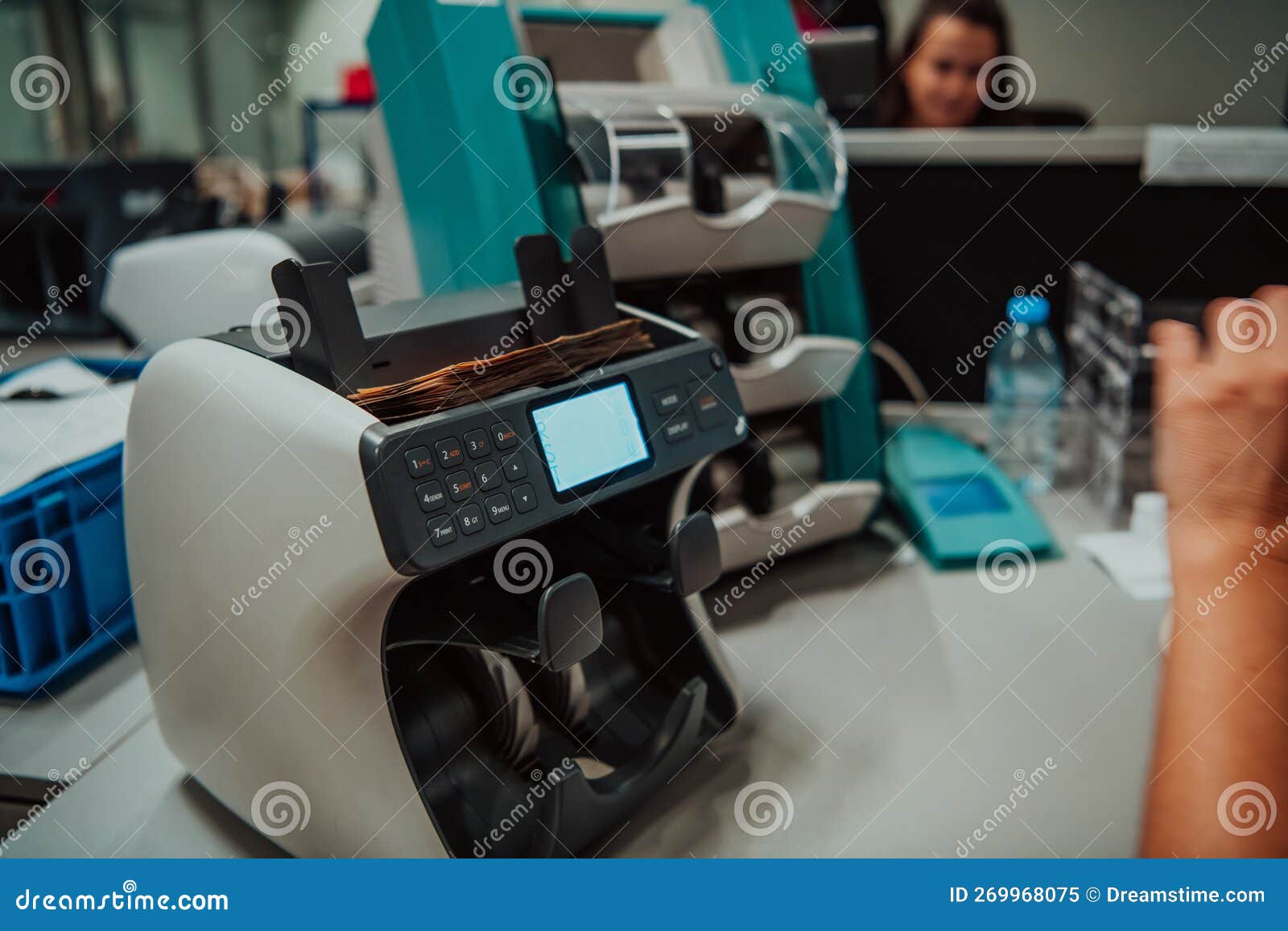 Bank Employees Using Money Counting Machine while Sorting and Counting ...