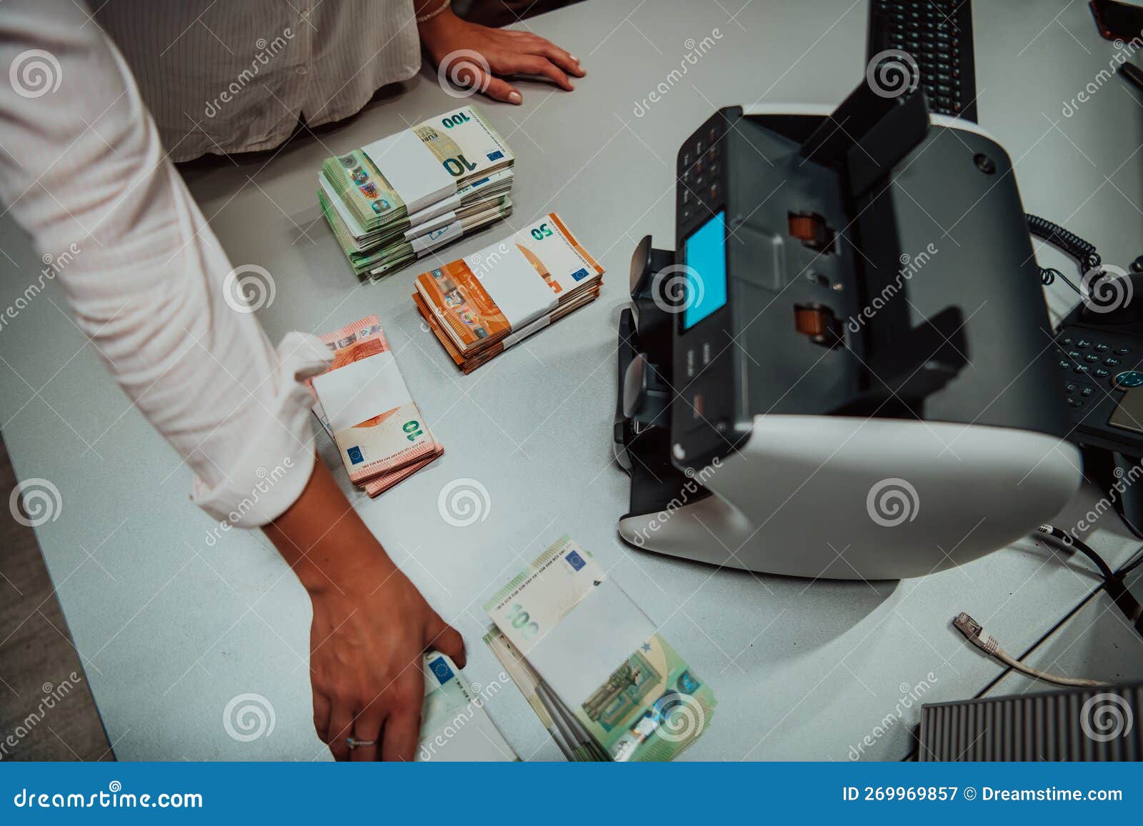 Bank Employees Using Money Counting Machine while Sorting and Counting ...