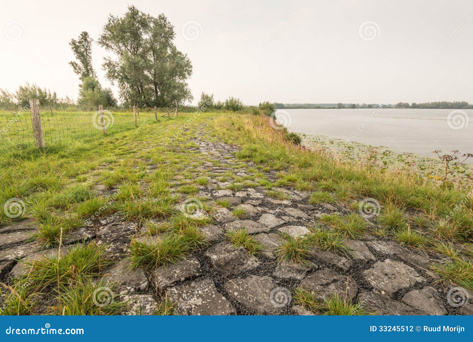 Bank of a River Strengthens with Basalt Blocks Stock Photo - Image of ...