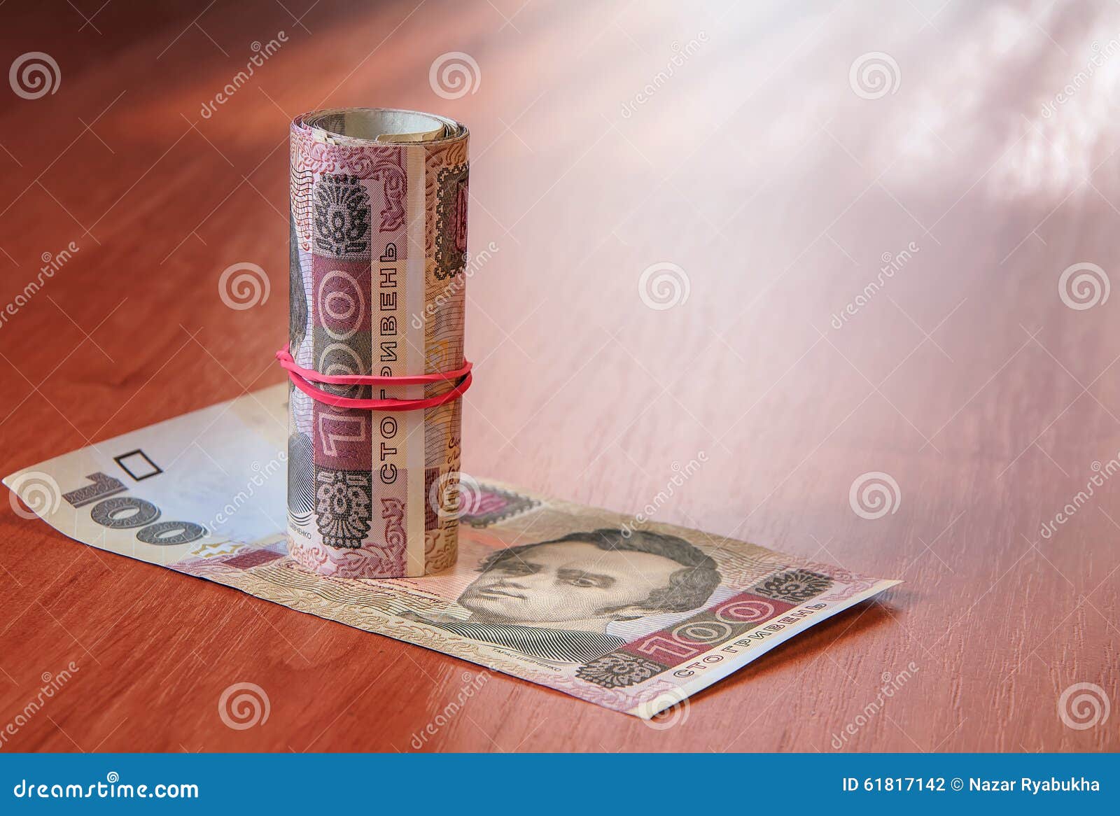 Bank Roll of Ukrainian Hryvnia on the Table Stock Photo - Image of bill ...