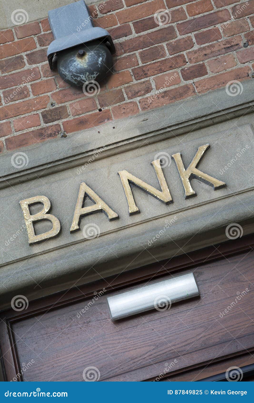 Bank Sign stock image. Image of gold, wall, door, brick - 87849825