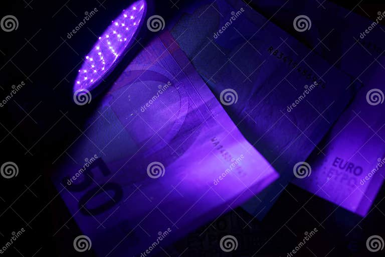 Banknotes in UV light. stock image. Image of economic - 109629133