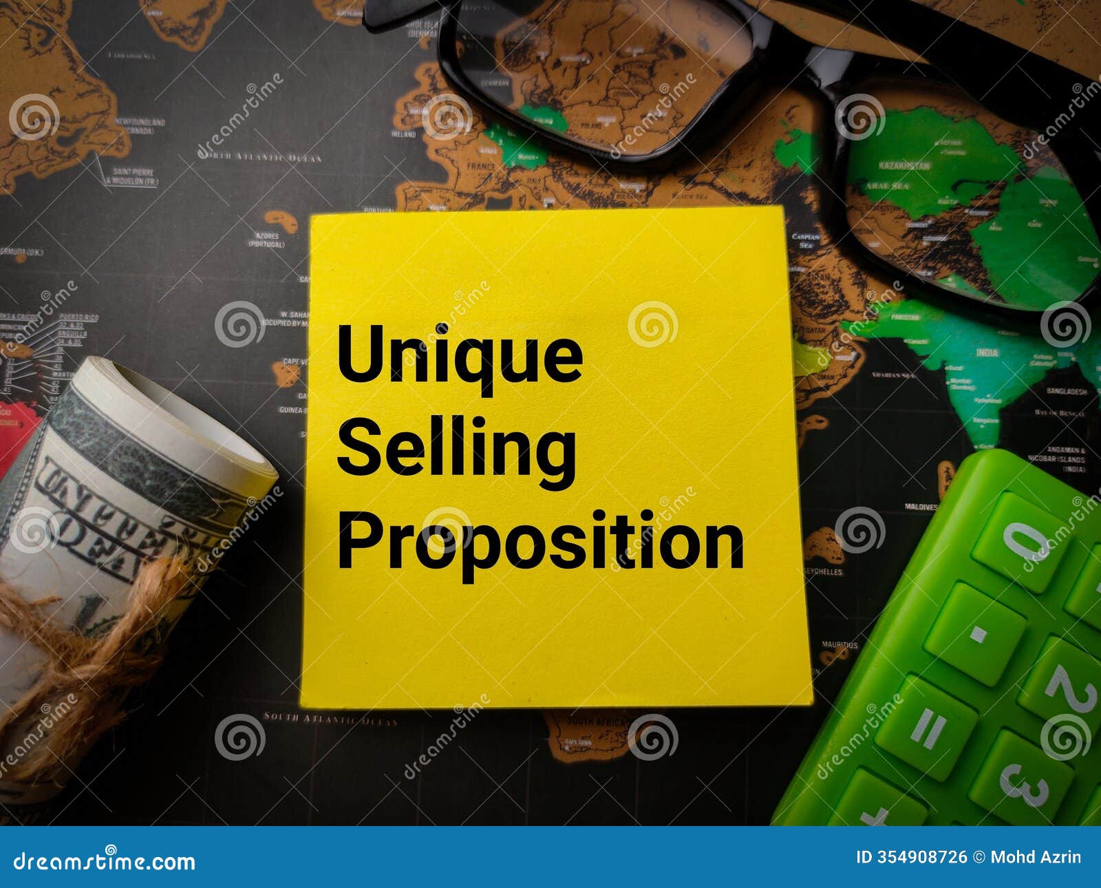 Banknotes,glasses and Calculator with Text Unique Selling Proposition ...