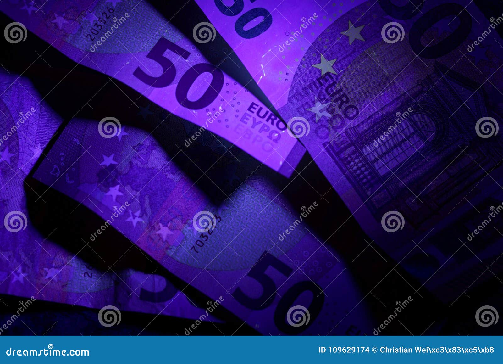 Banknotes in UV light. stock photo. Image of economic - 109629174