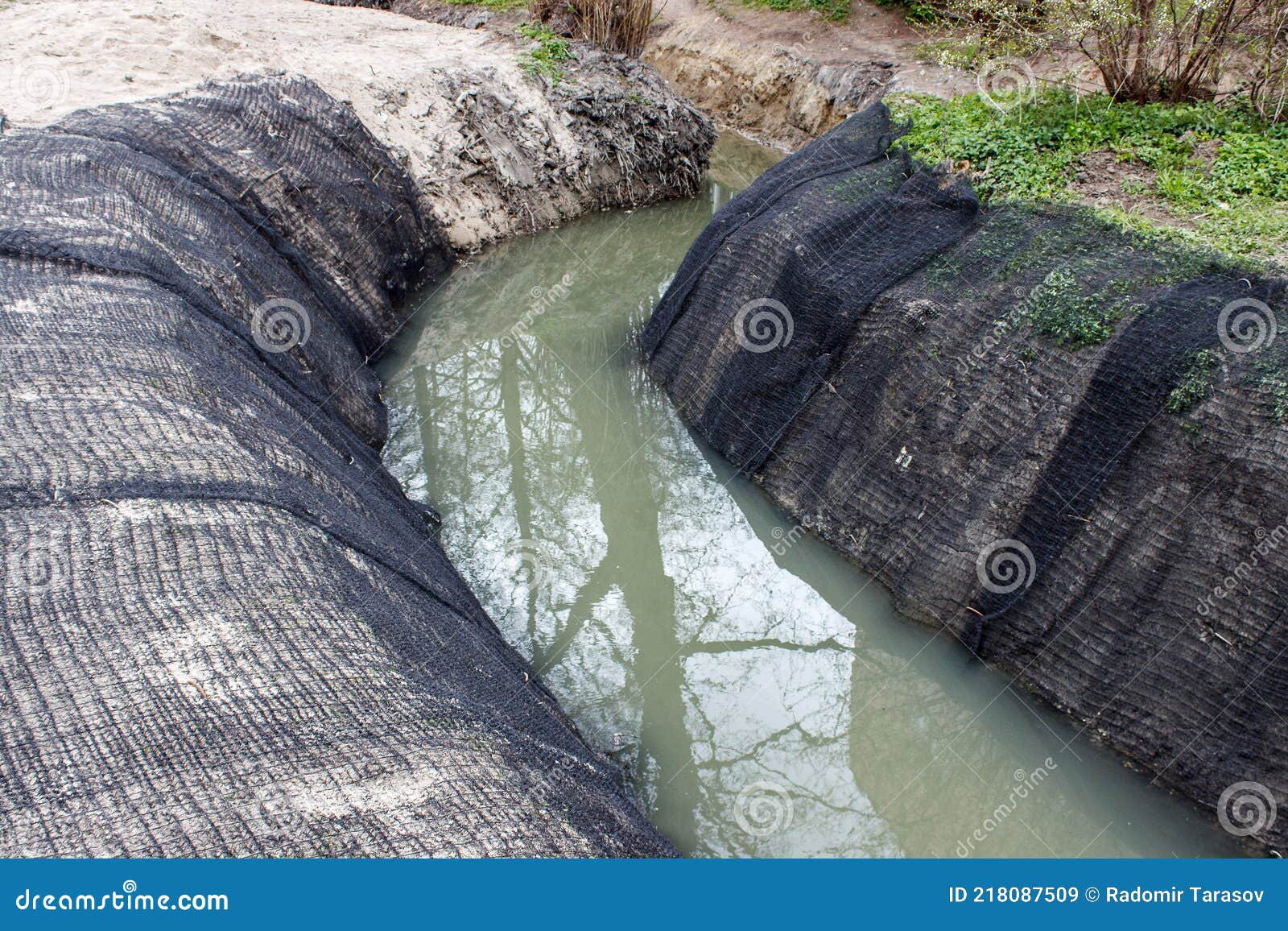Banks of the Stream are Covered with a Special Mesh Stock Image - Image ...