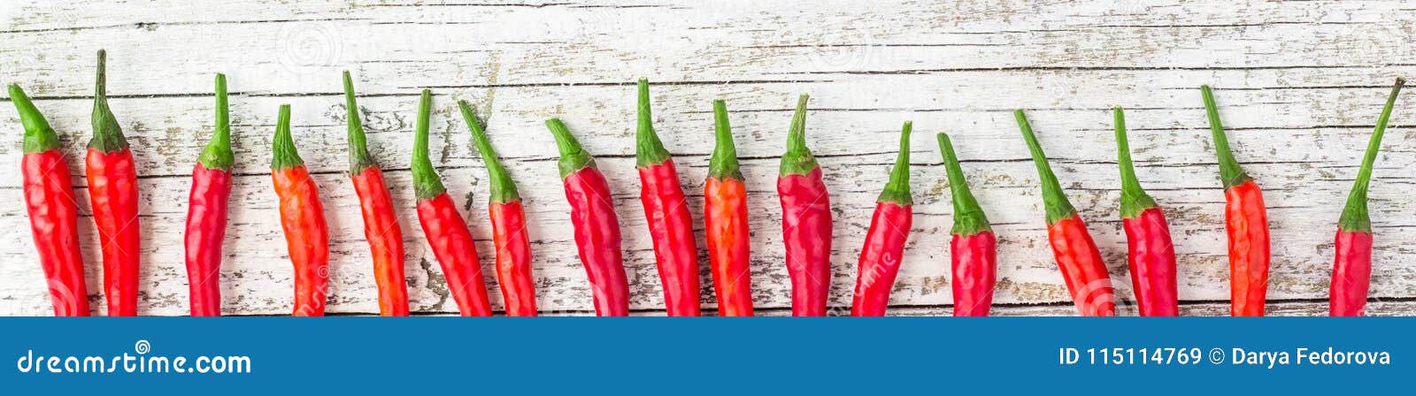 Banner of Frame of Red Chile Pepper on White Wooden Table Stock Image ...