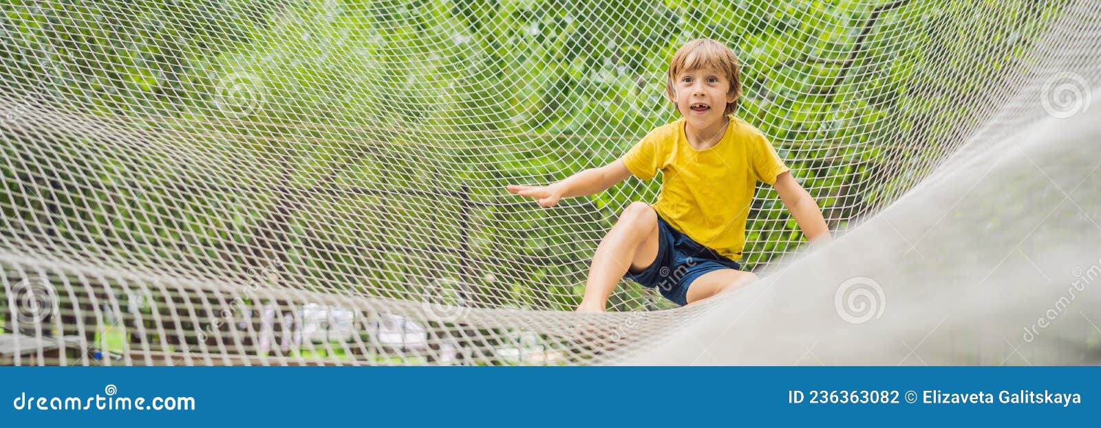 BANNER, LONG FORMAT Practice Nets Playground. Boy Plays in the ...