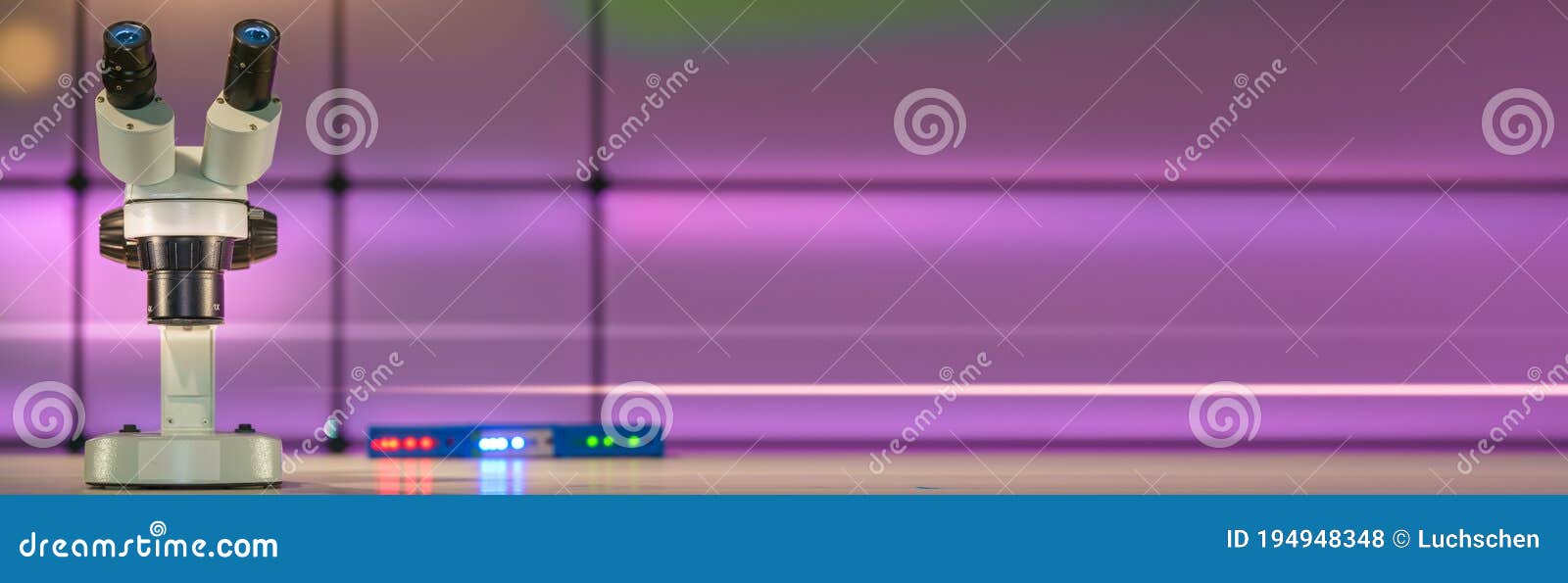 Banner with a Microscope on a Table in a Science Lab Stock Photo ...