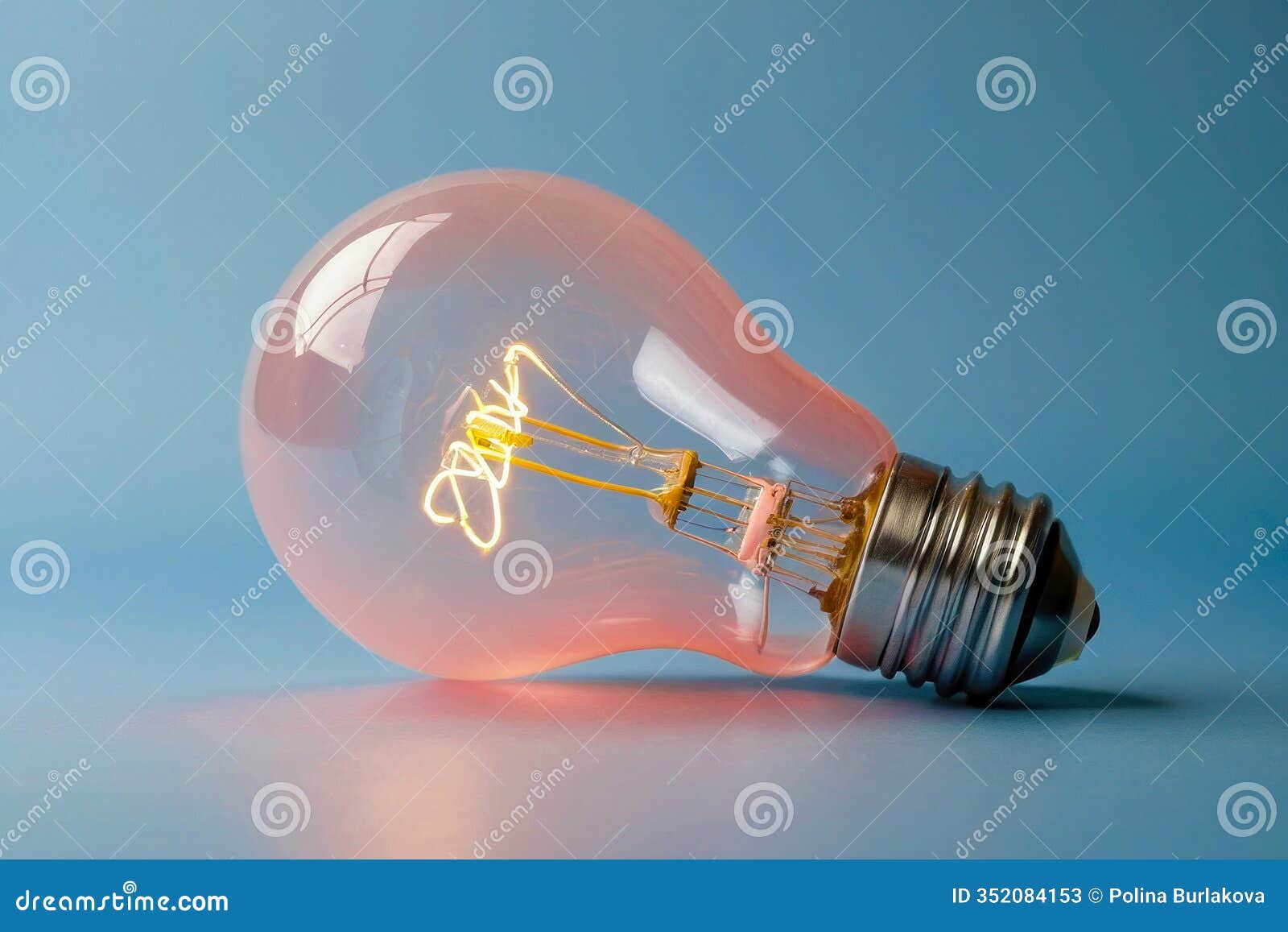 Banner Template, Glowing Light Bulb Lies on a Blue Pastel Background ...