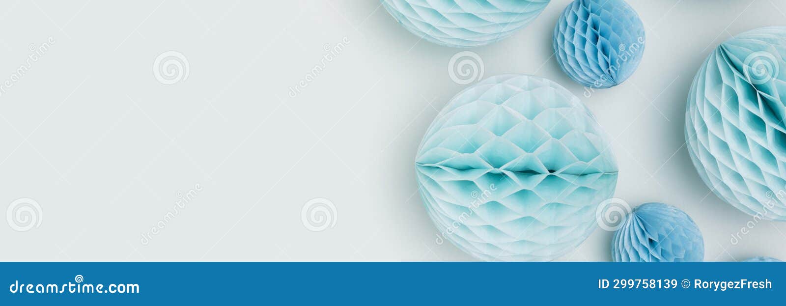 Banner with Tissue Paper Balls Different Sizes on a Blue Background ...