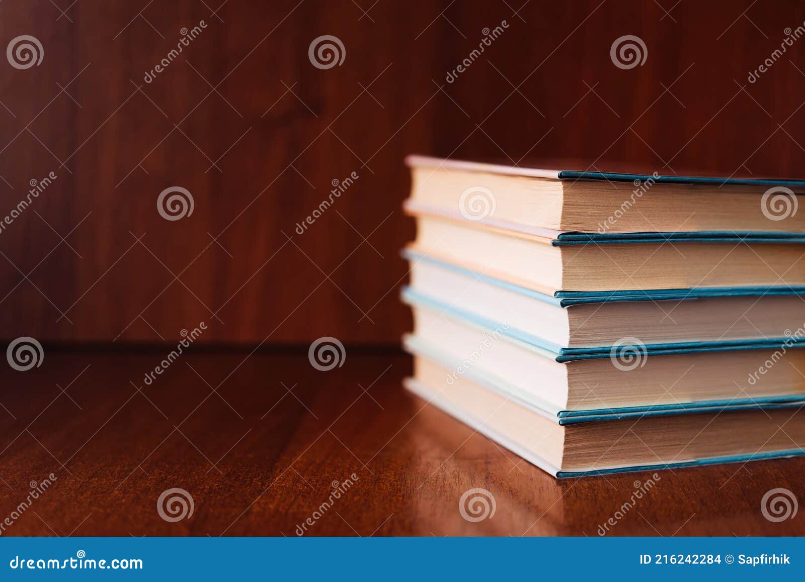Banner with Wide Bookshelf and a Stack of Hardcovered Books with ...
