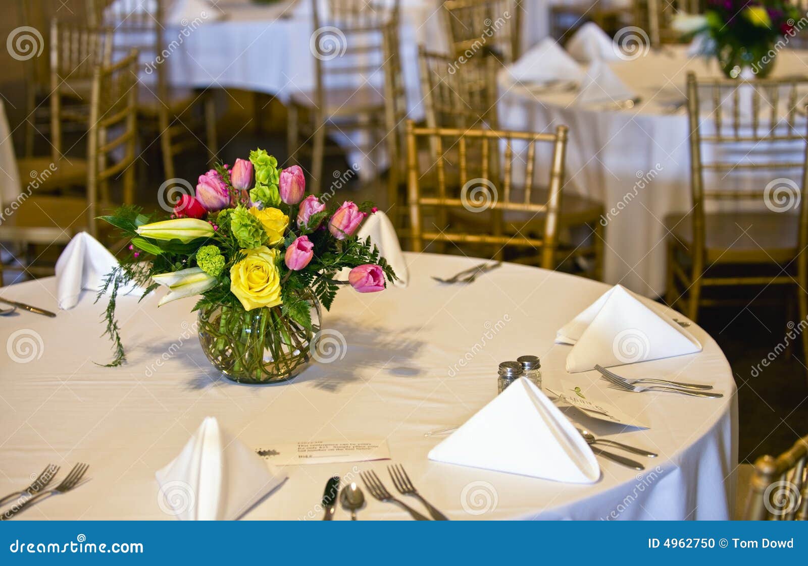 Banquet Table With Forks, Knives, Plates And Flowers And Berries Stock ...