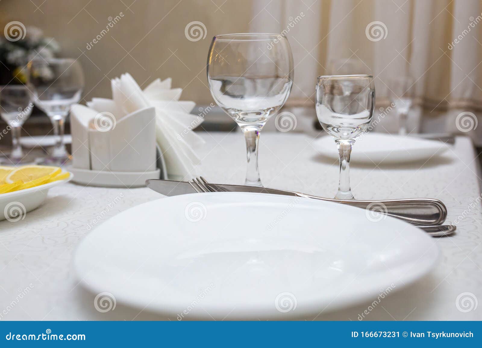 Banquet Table Served with Instruments and Decorated with Empty Wine ...