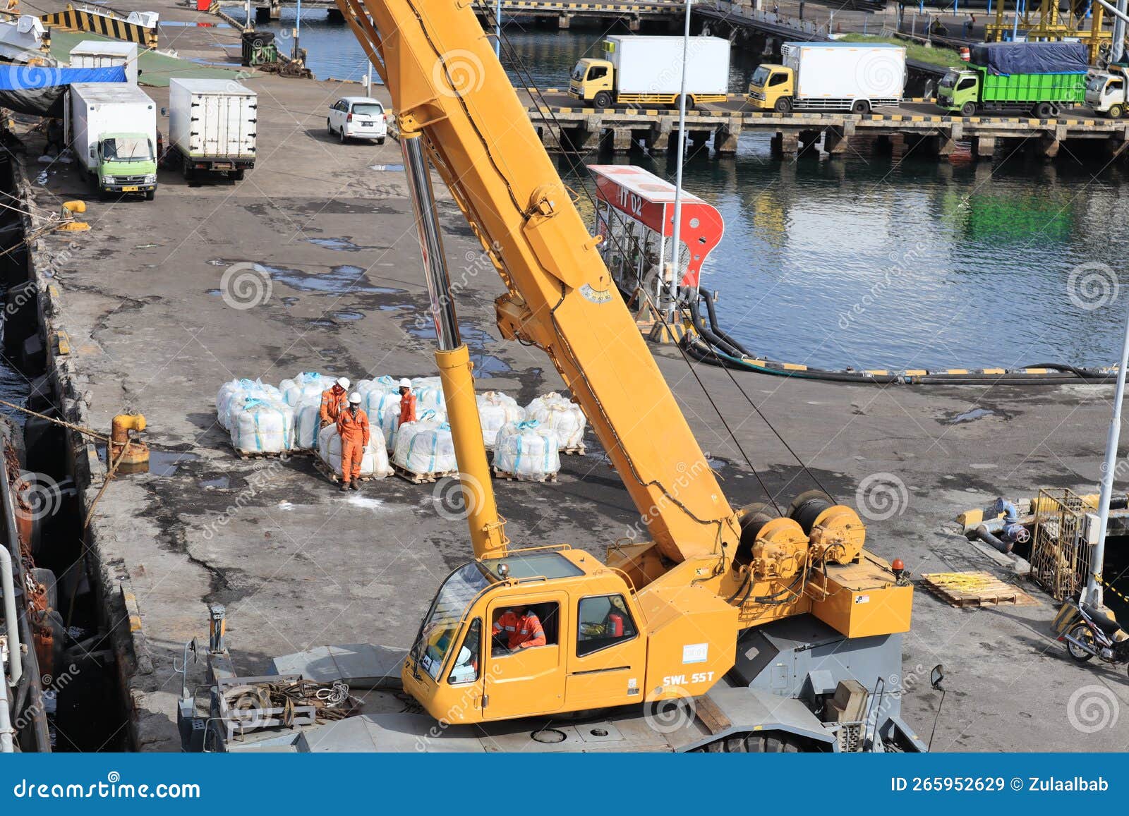Banyuwangi, May 2022. Several Stevedores are Assisting the Process of ...