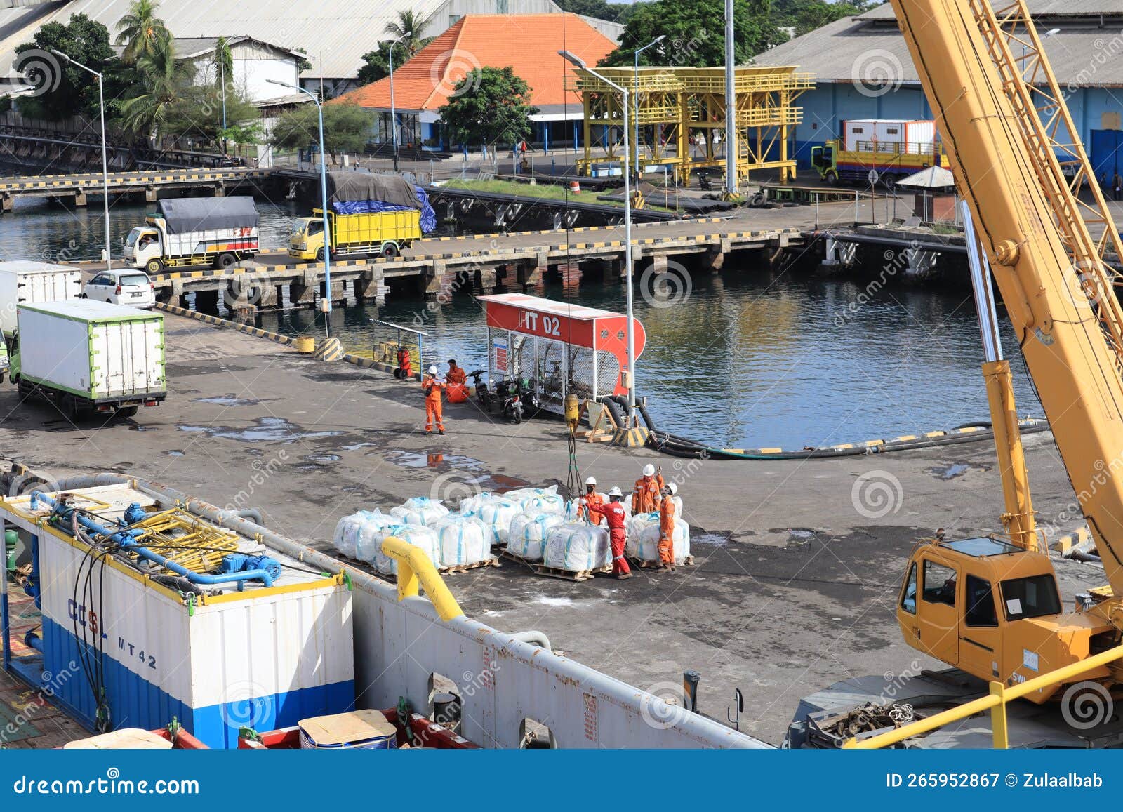 Banyuwangi, May 2022. Several Stevedores are Assisting the Process of ...