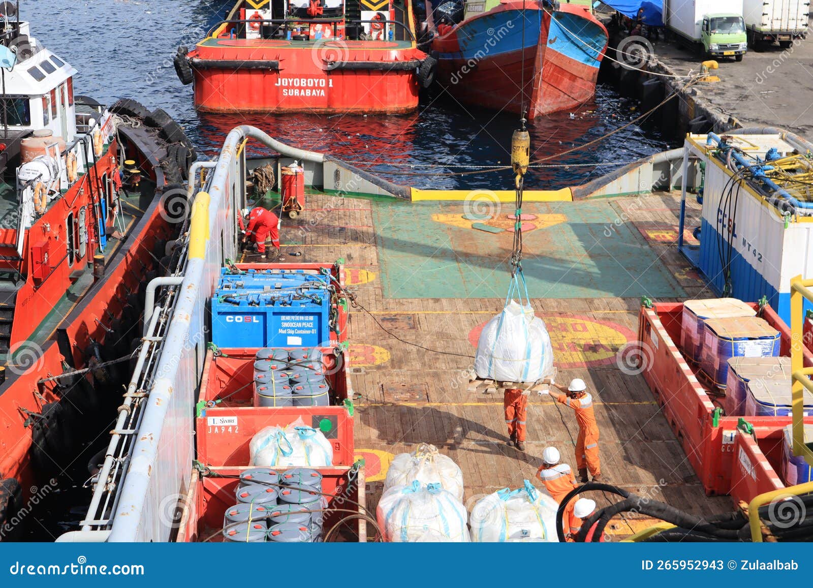 Banyuwangi, May 2022. Several Stevedores are Assisting the Process of ...