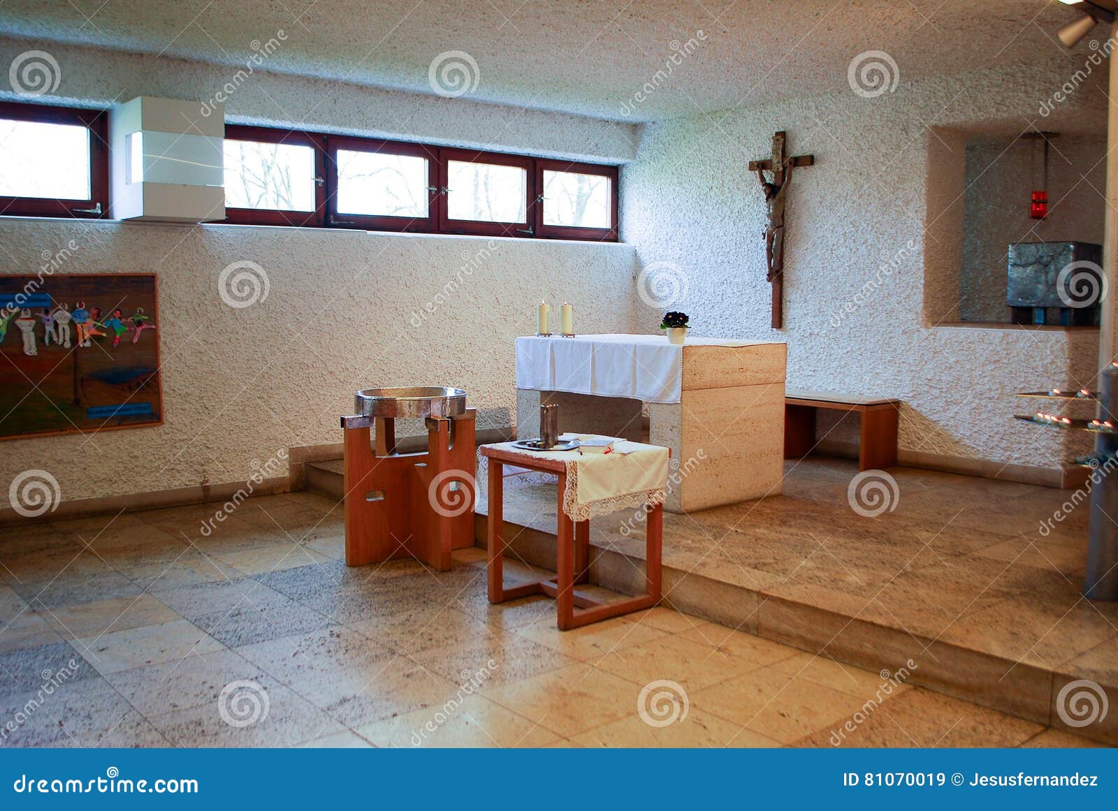 A Baptismal Font Stands in Front of an Altar Editorial Stock Image ...