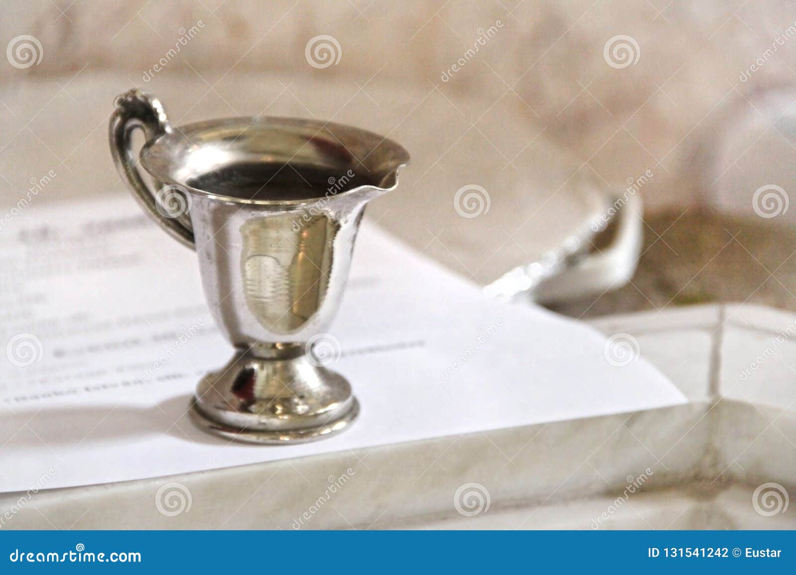 Baptismal Jug with a Holy Water. Baptismal Water and Can Stock Photo ...