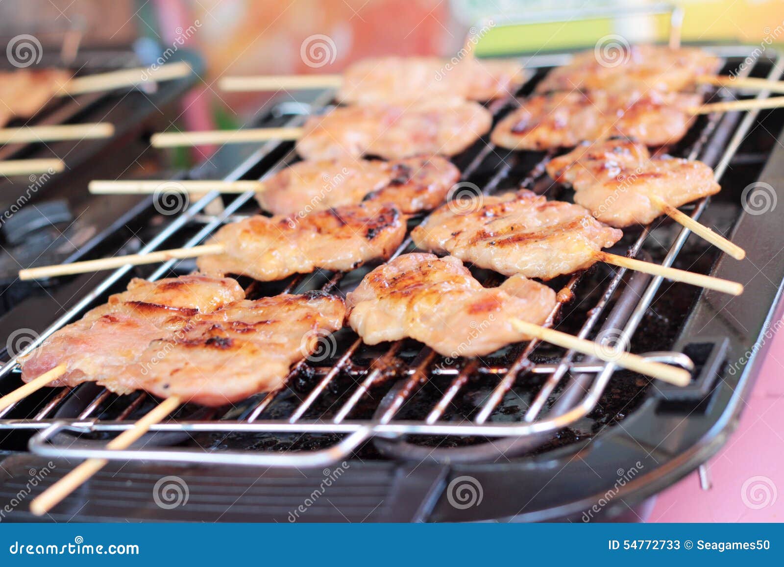 Bar-B-Q pork at the market stock image. Image of skewer - 54772733