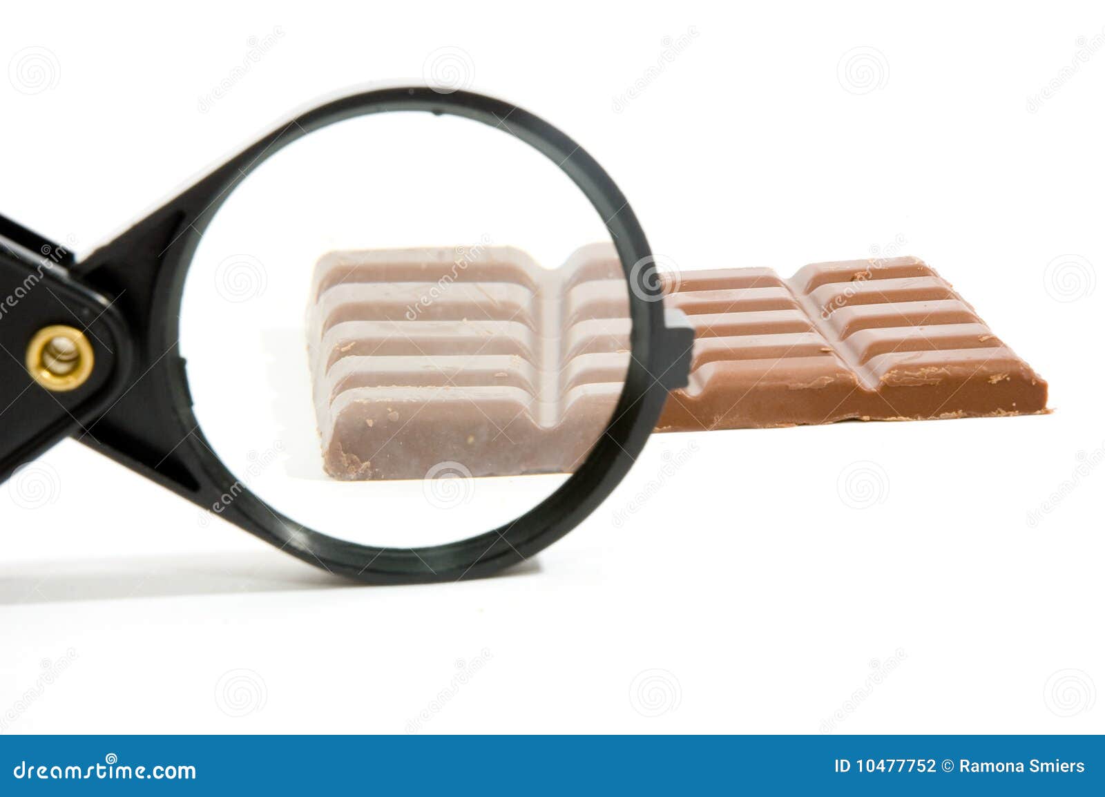 Bar of Chocolat Sized Up by a Magnifying-glass Stock Photo - Image of ...