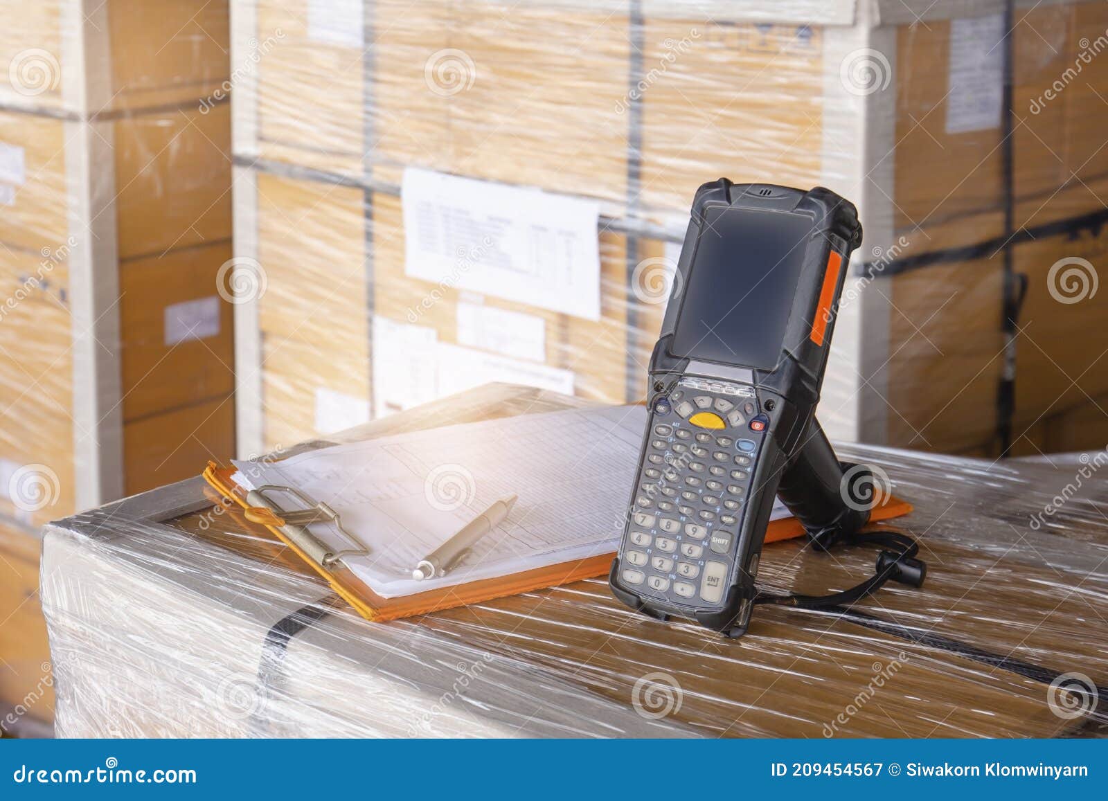 Bar Code Scanner And Clipboard On Cardboard Cargo Boxes. Computer Tools ...