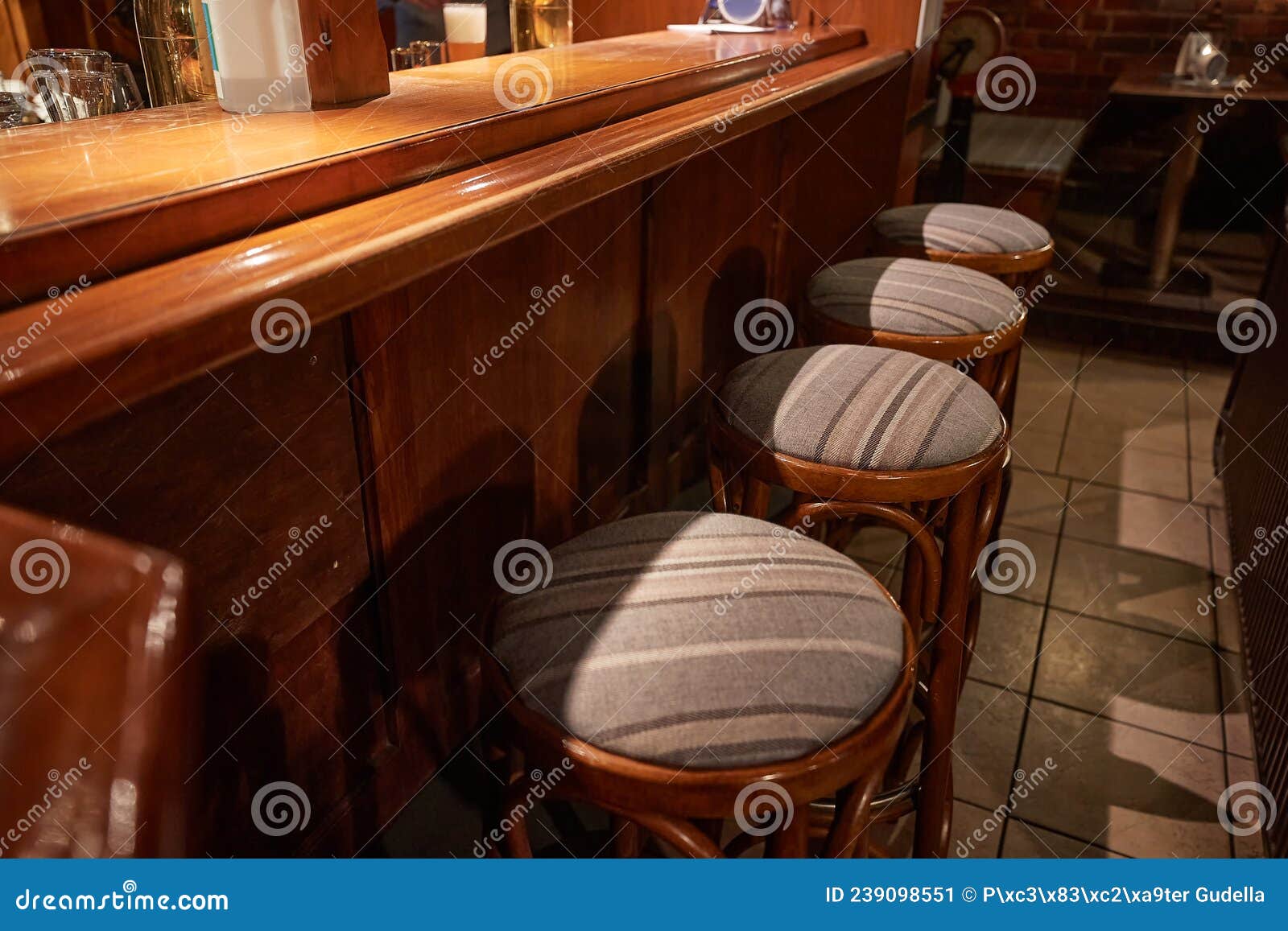 Bar stools at the counter stock image. Image of stool - 239098551