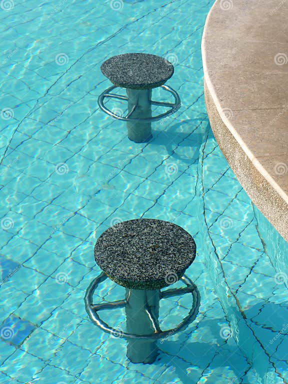 Bar Stools Under Water in Swimming Pool. Stock Image - Image of garden ...