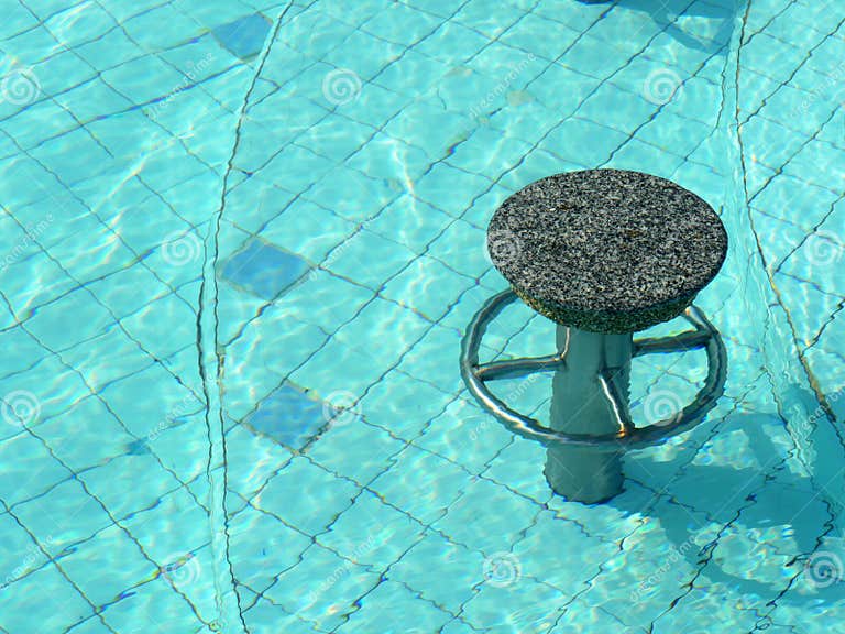 Bar Stools Under Water in Swimming Pool. Stock Photo - Image of ...