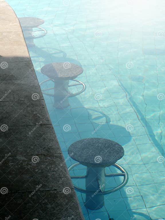 Bar Stools Under Water in Swimming Pool. Stock Photo - Image of pattern ...