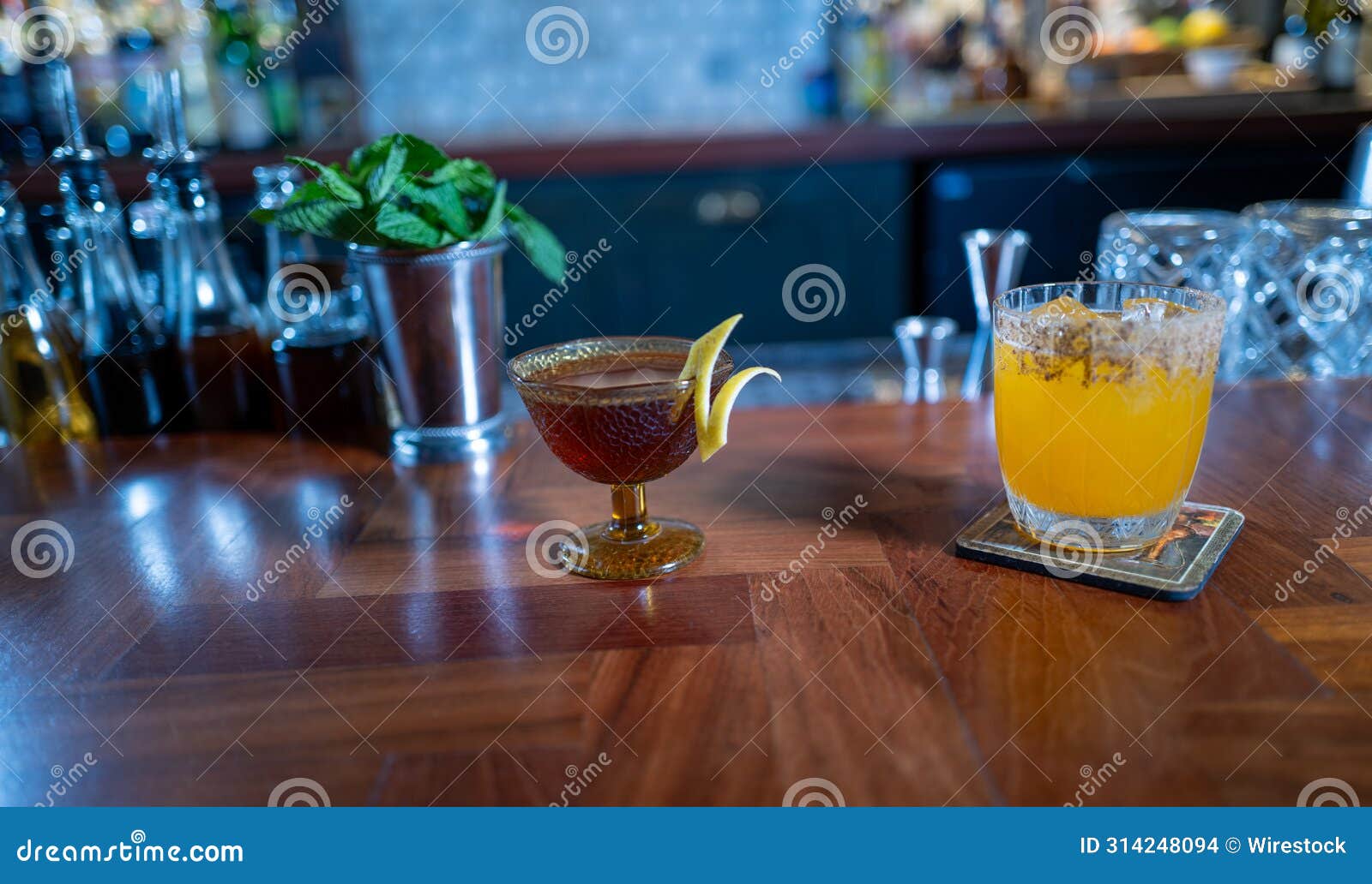Bar Table with Assorted Cocktails in a Trendy Bar Setting Stock Photo ...